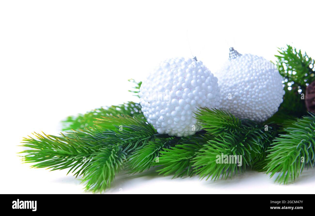 Christmas balls on fir tree, isolated on white Stock Photo - Alamy