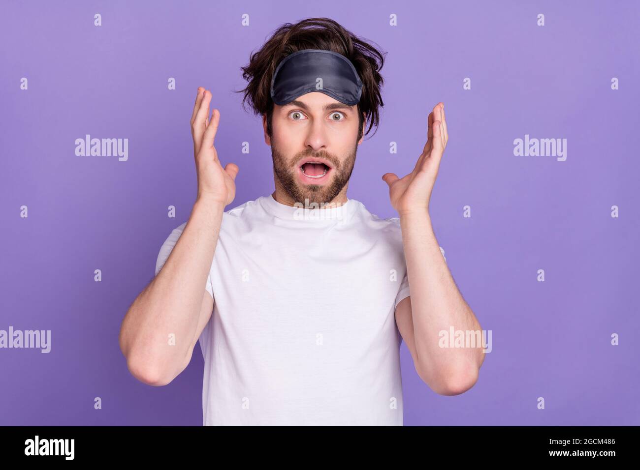 Portrait of confused frightened guy open mouth raise arms staring ...