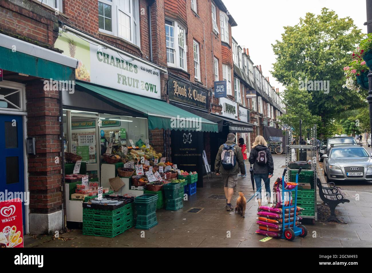 London August 2021: Pitshanger Lane shops, a busy high street of ...