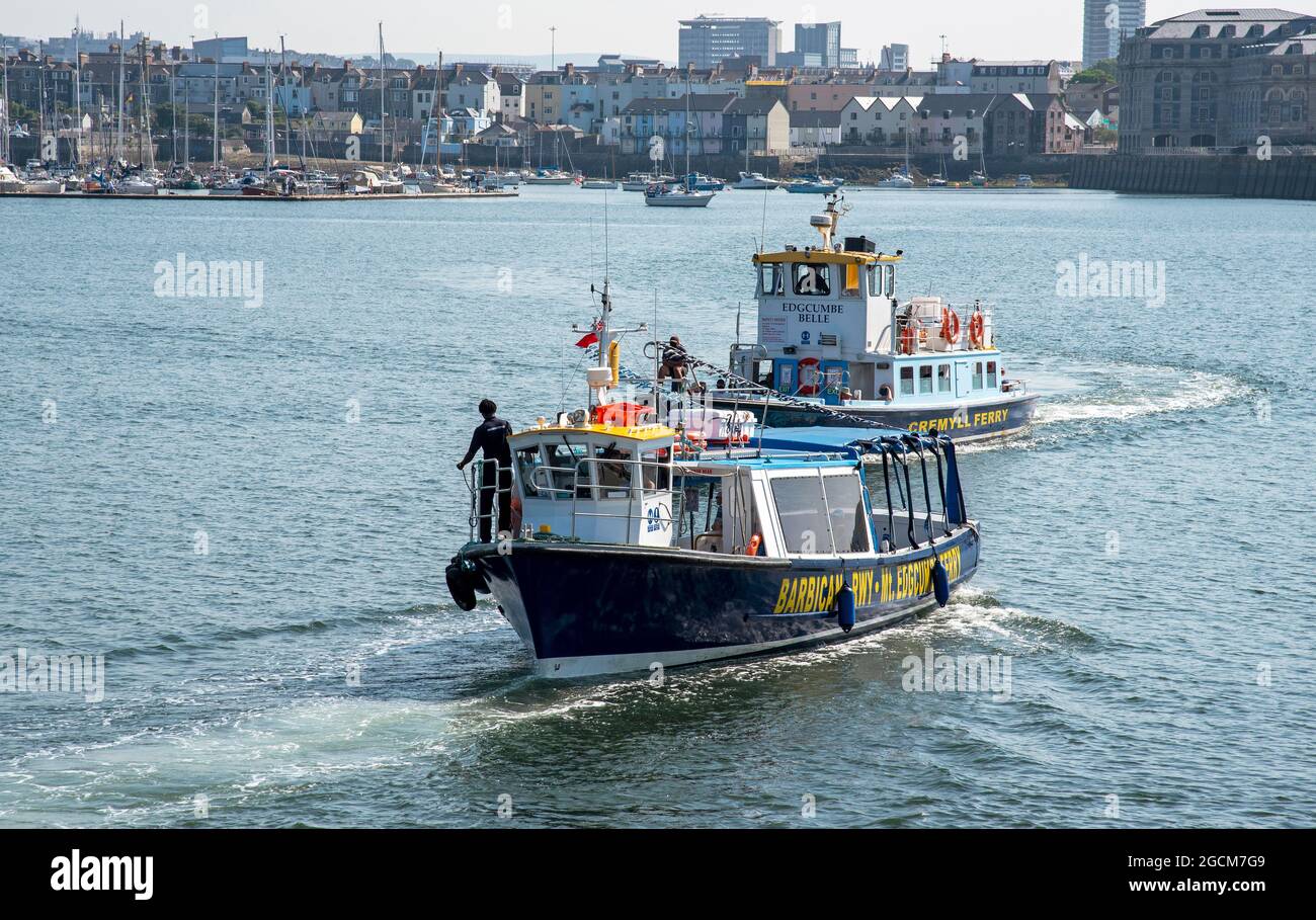 Cremyll, Cornwall, England, UK. 2021. Two passenger ferries arriving at ...