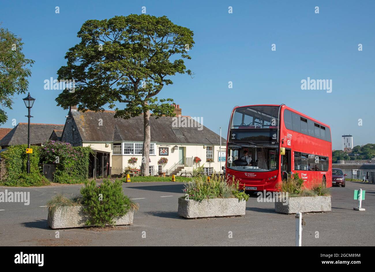 Cremyll, Cornwall, England, UK. 2021. A red double decker bus waiting ...