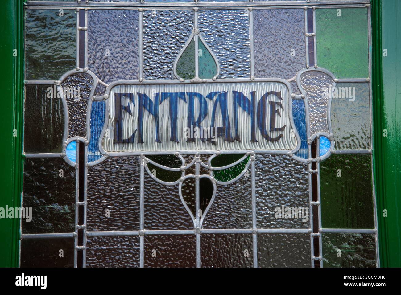 Entrance sign on door Stock Photo - Alamy