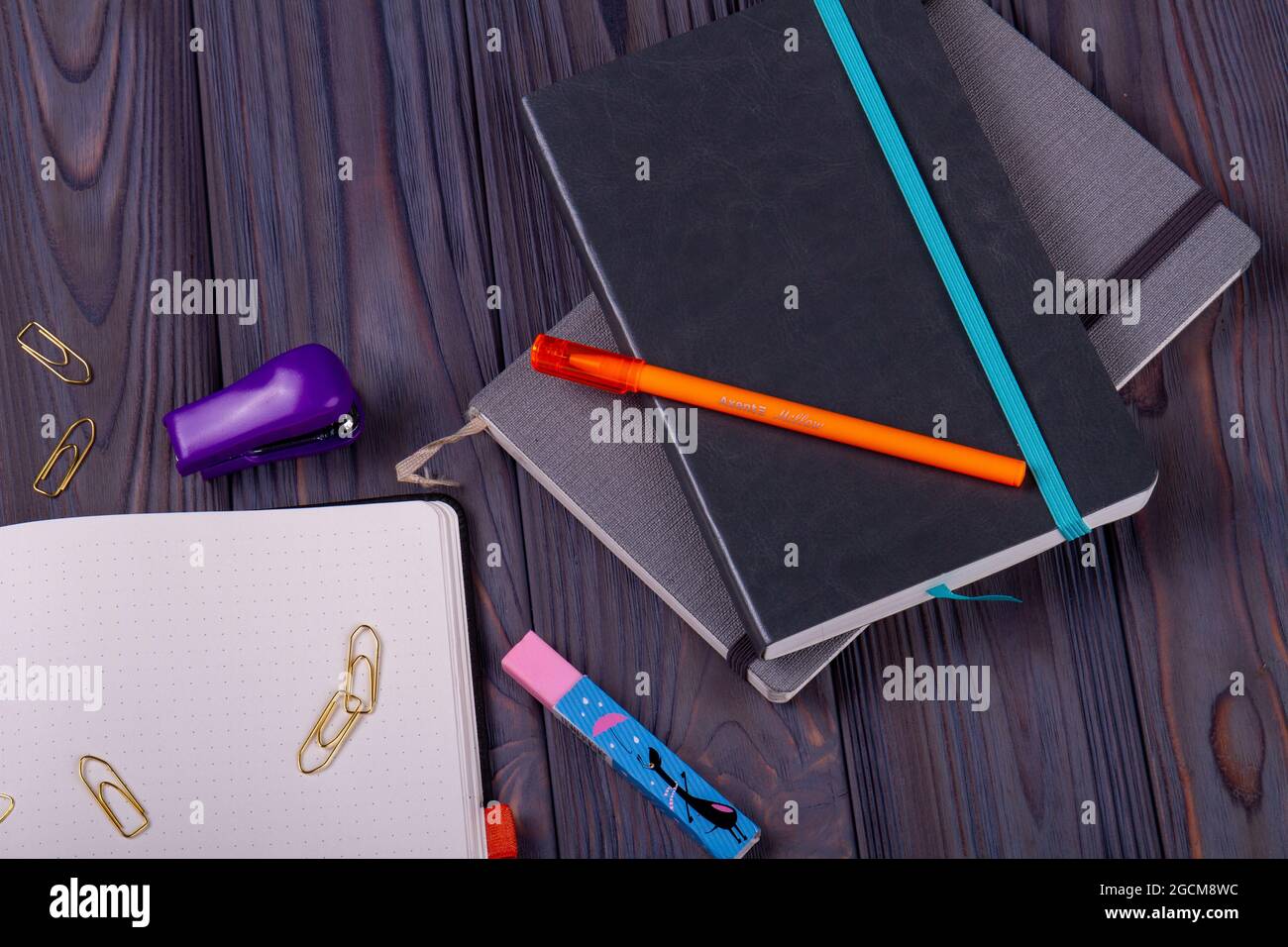 Top view pens with books and paper clips Stock Photo - Alamy