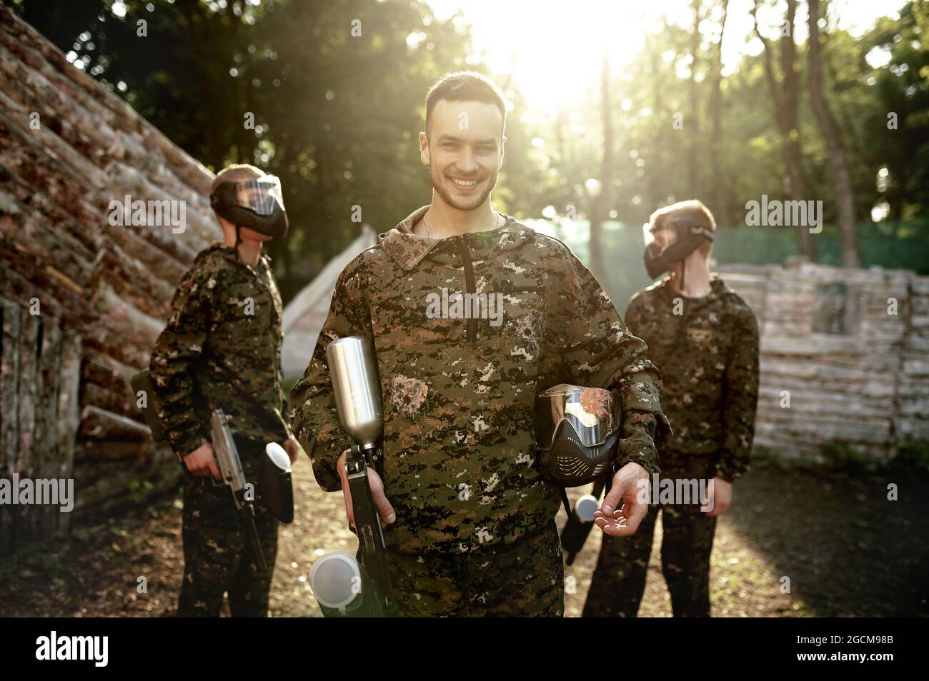 Paintball team, warriors poses on playground Stock Photo - Alamy