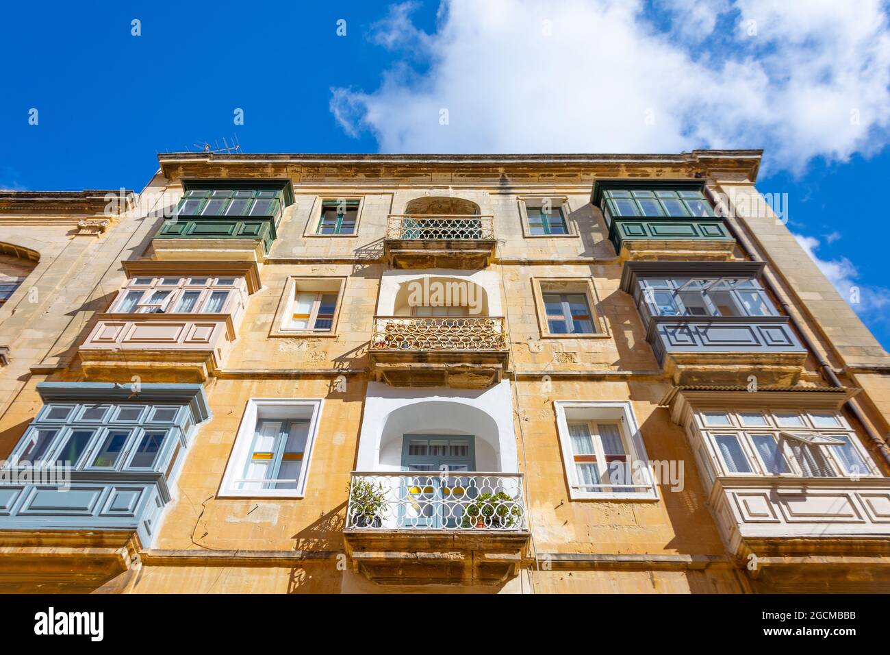 Traditional old balconies in a residential building of the town Stock ...
