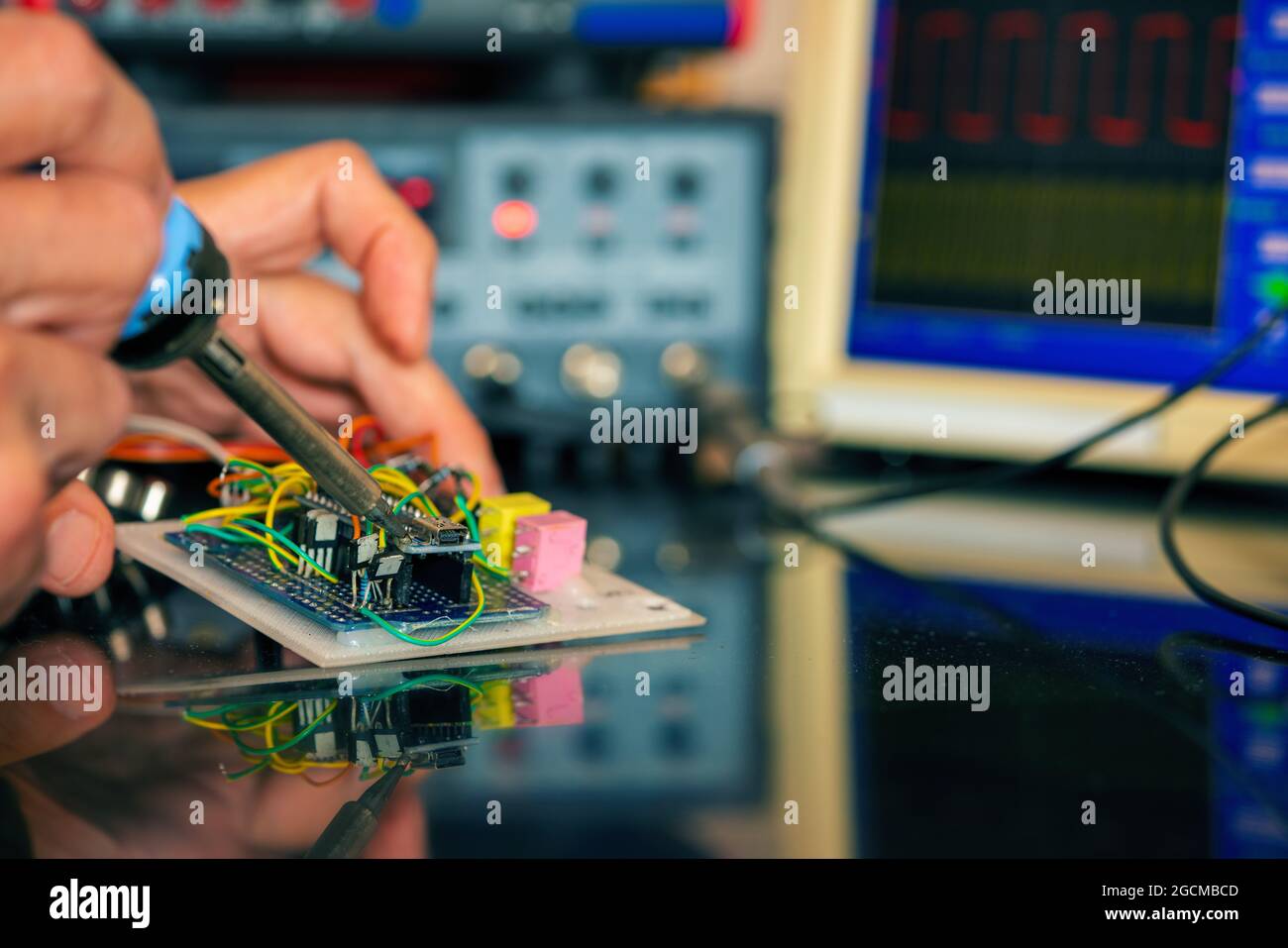 Manufacturing and setting up an electronic device in the laboratory ...