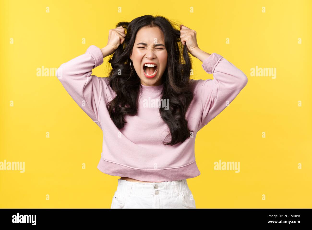 Lifestyle, emotions and advertisement concept. Angry distressed asian ...