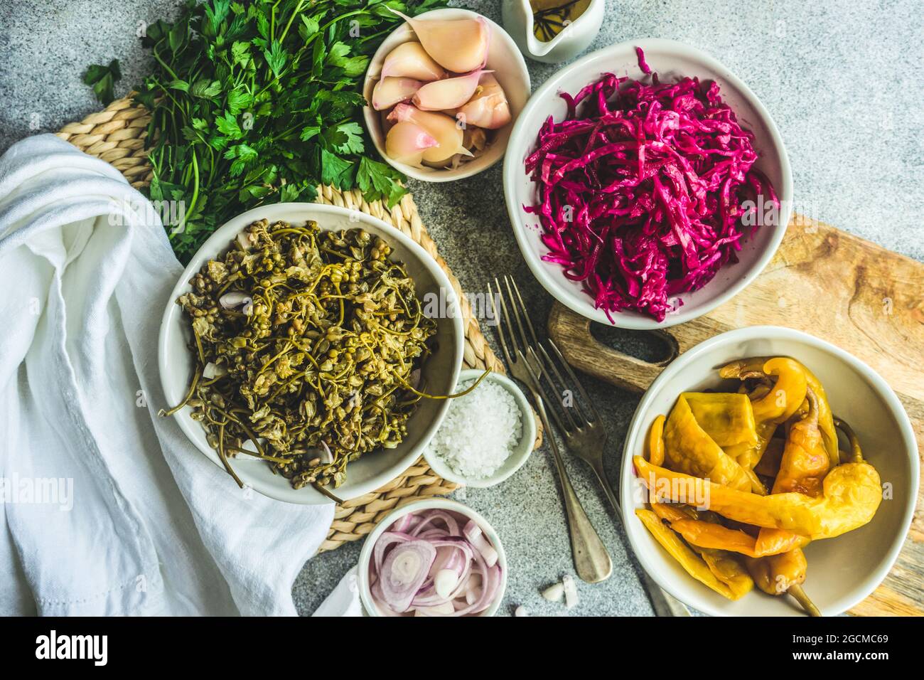 Traditional Georgian pickled jonjoli appetiser with red onion, pickled ...