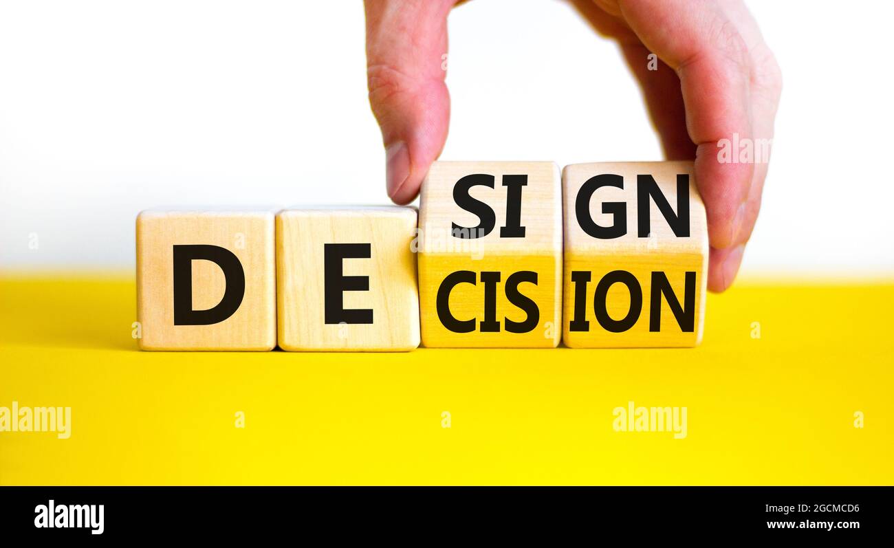 Decision or design symbol. Businessman turns wooden cubes and changes ...
