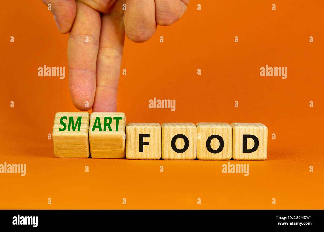 Smart food symbol. Doctor turns cubes and changes words 'food' to ...