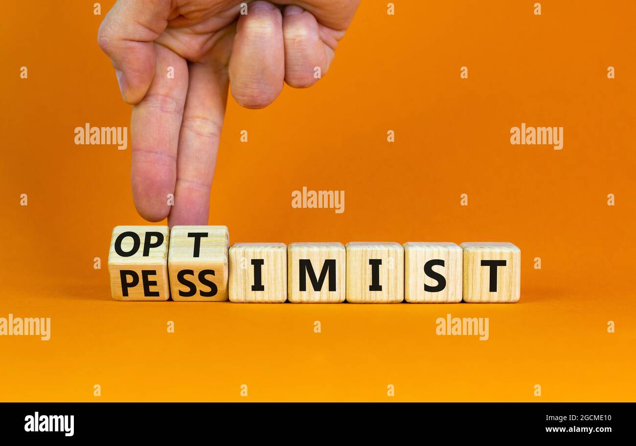 Pessimist or optimist symbol. Businessman turns cubes and changes the ...