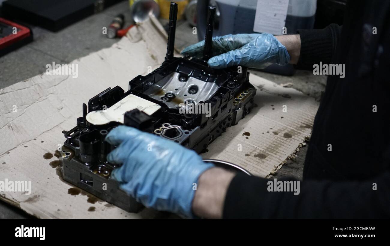 automatic transmison repair at the mechanics Stock Photo - Alamy