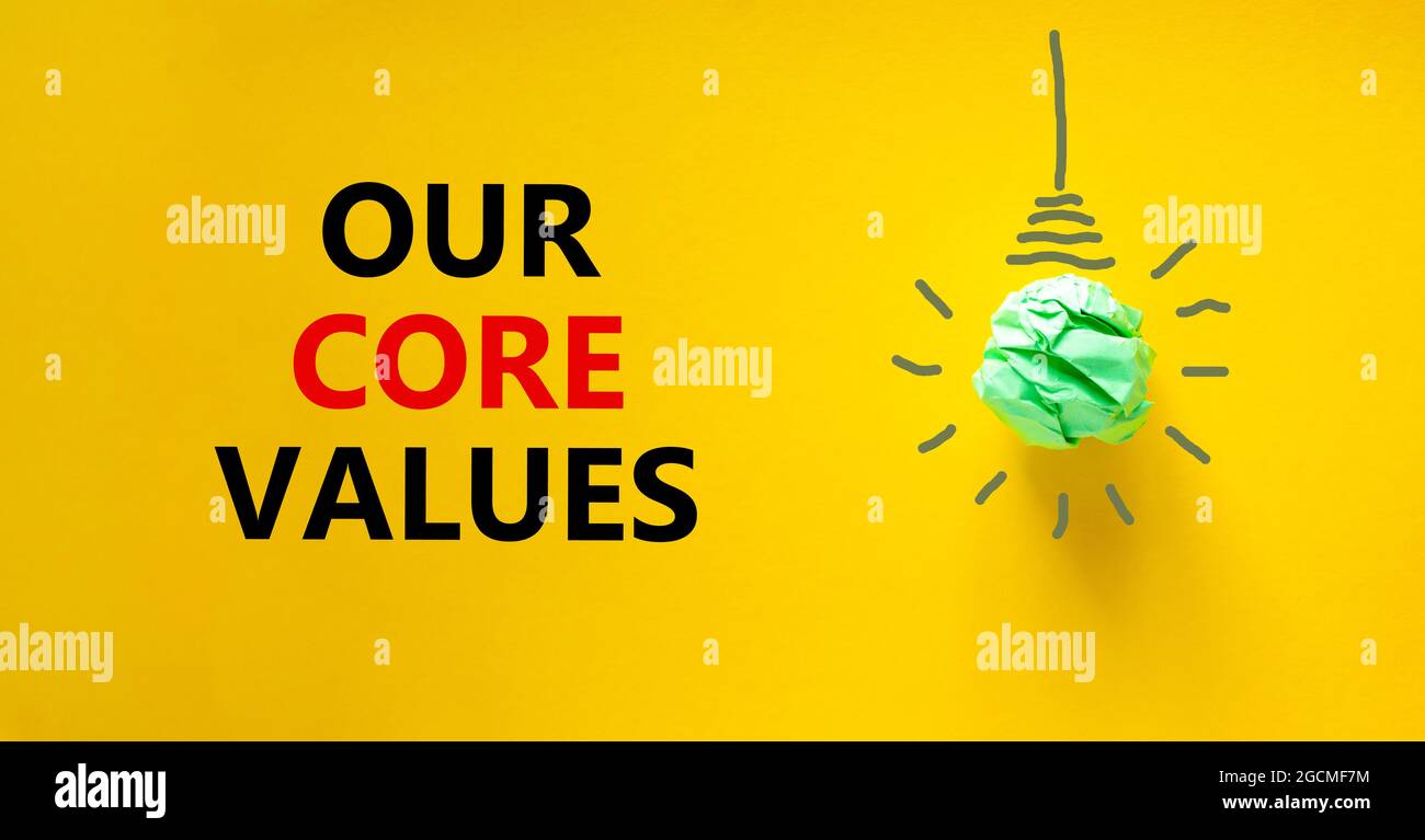 Our core values symbol. Green shining light bulb icon. Words 'Our core ...