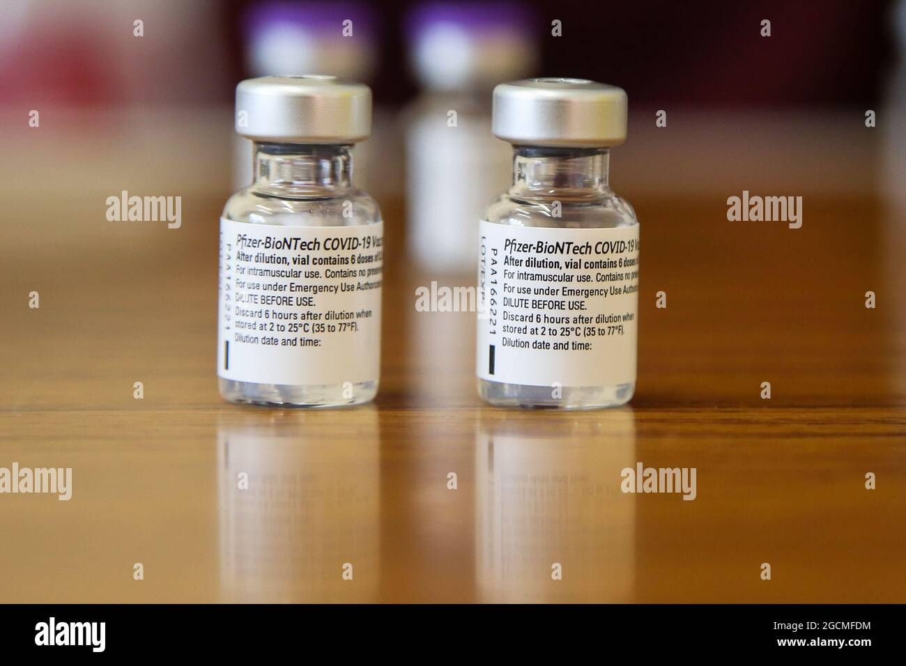 London, UK. 02nd Aug, 2021. Vials containing Pfizer-BioNTech Covid-19 ...