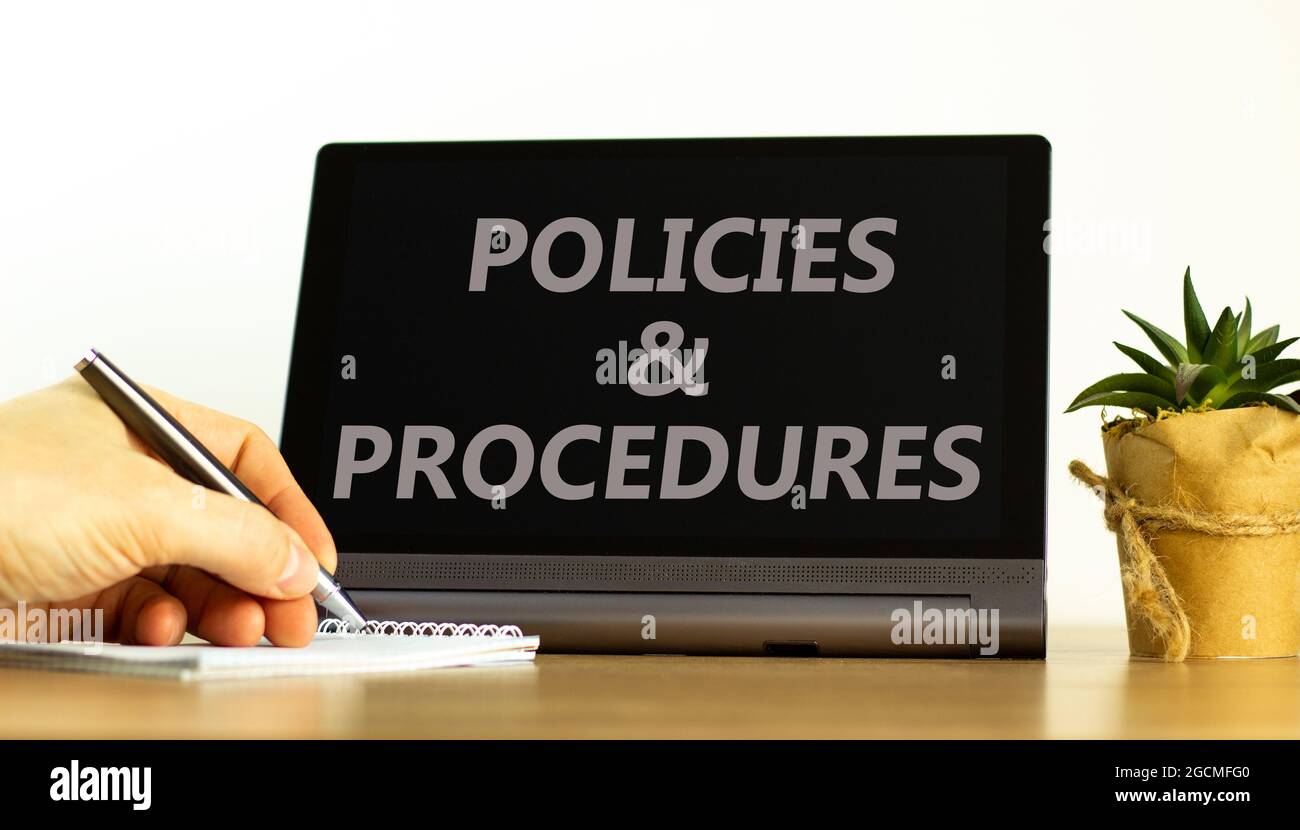 Policies and procedures symbol. Tablet with words 'Policies and ...