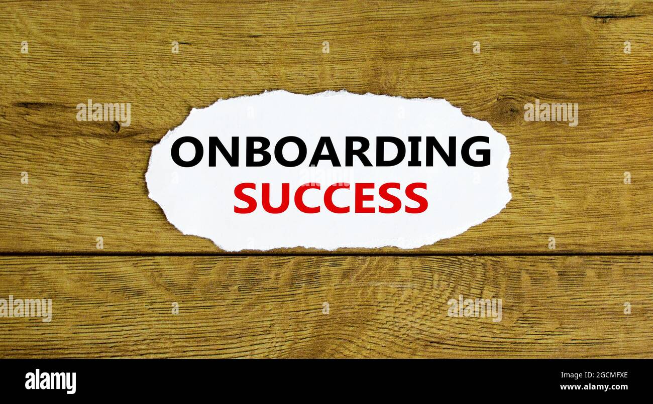 Onboarding success symbol. Words 'Onboarding success' on white paper ...