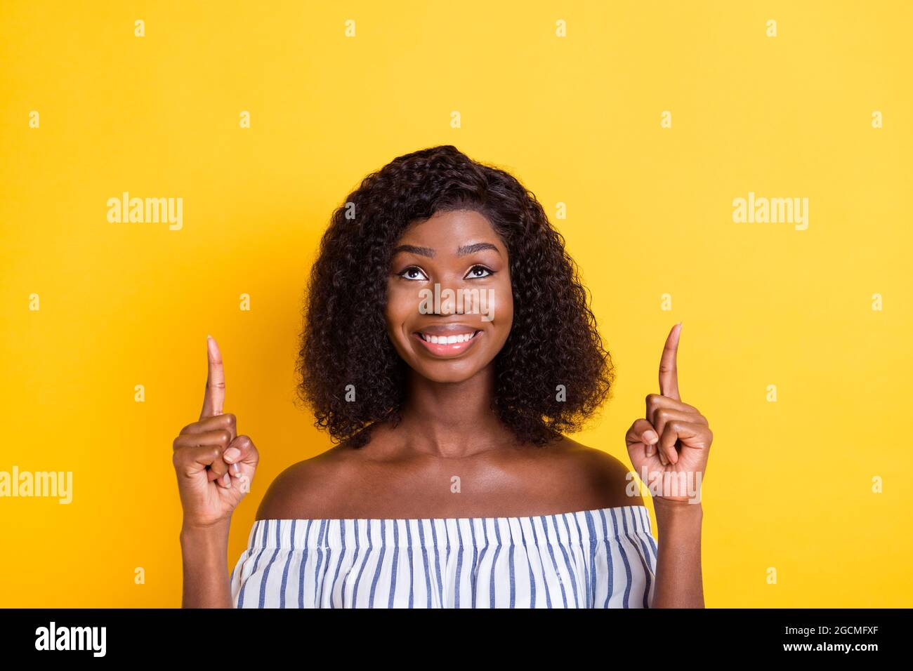 Photo of pretty funny dark skin lady dressed white clothes pointing ...