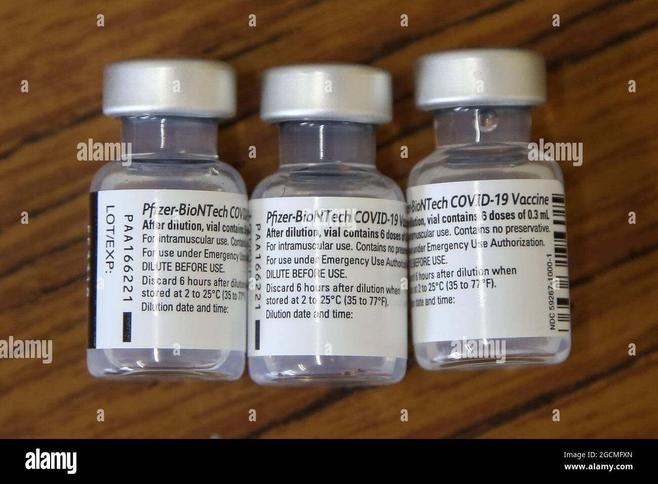 Vials containing Pfizer-BioNTech Covid-19 vaccine seen at a vaccination ...