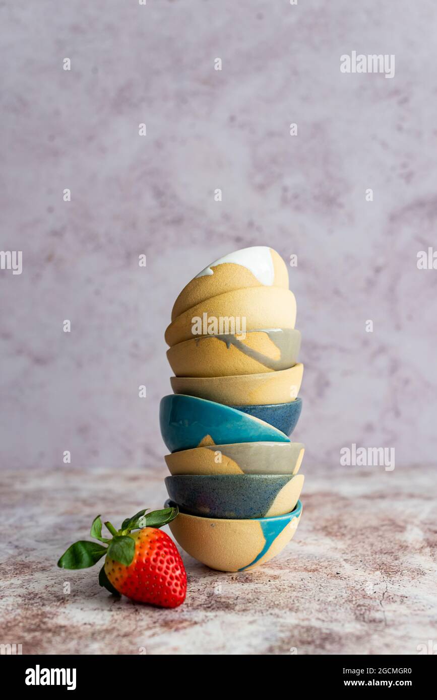 A stack of glazed ceramic bowls Stock Photo - Alamy