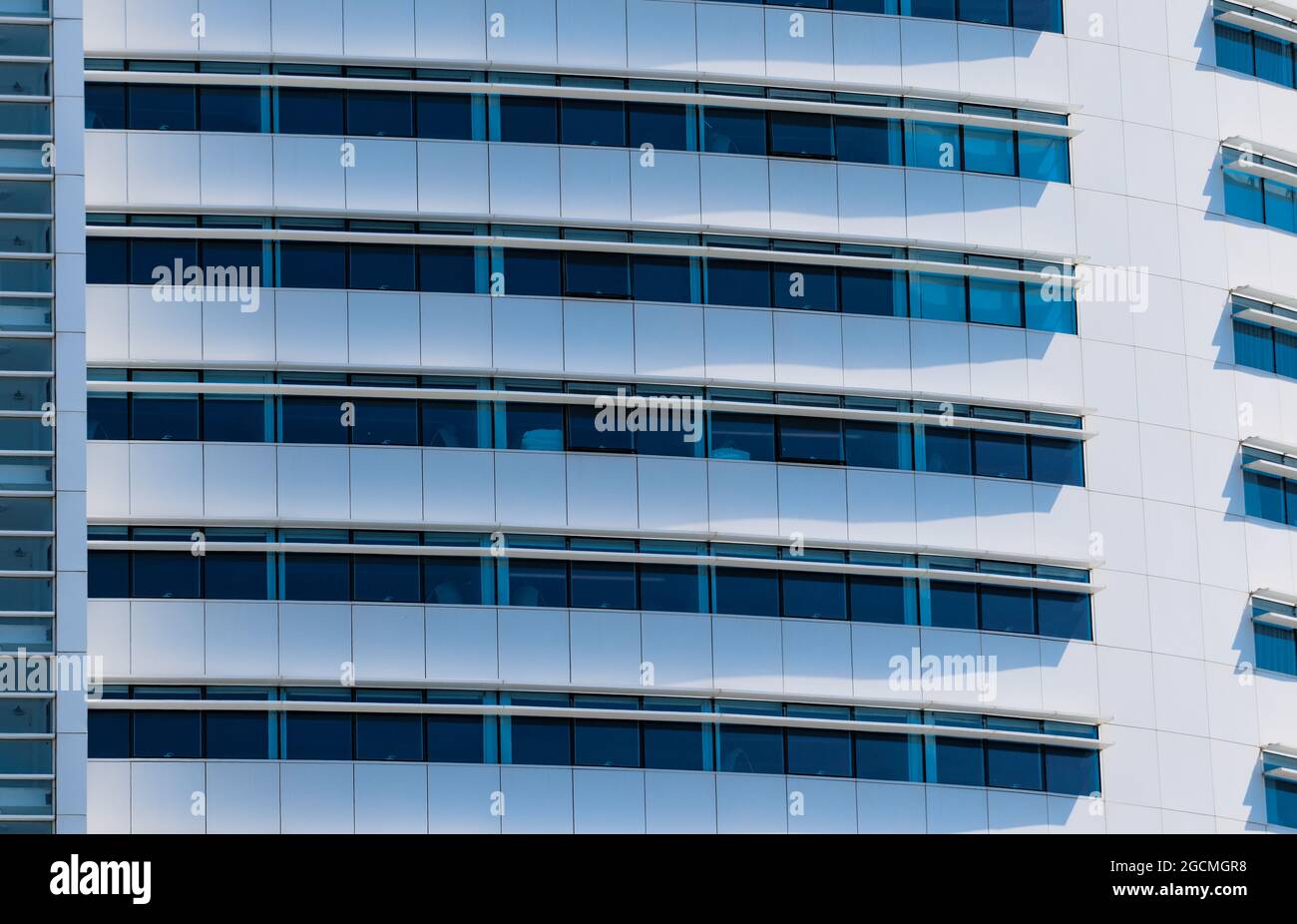 Modern building with glass windows Stock Photo - Alamy