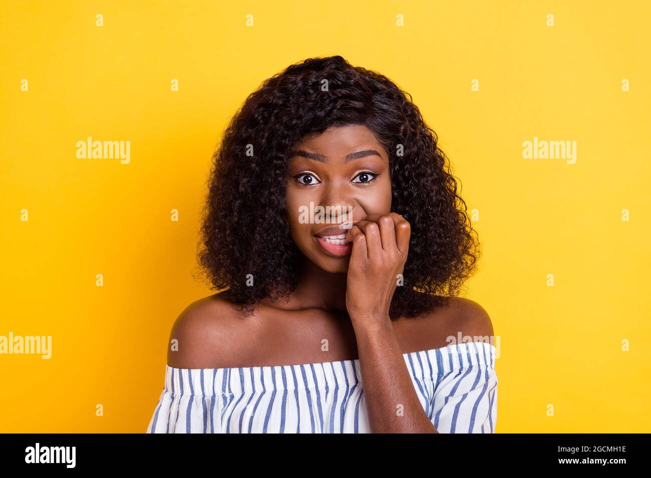Portrait of attractive unsure uncertain nervous girl worrying biting ...