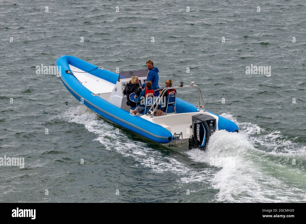 rigid inflatable boat, RIB underway, family at sea on boat, family ...