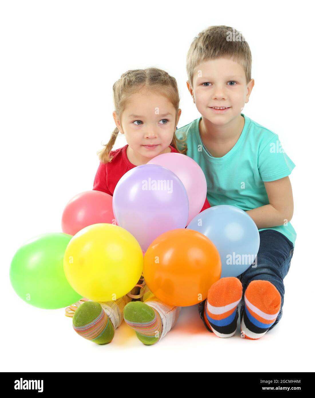 Little children with colorful balloons isolated on white Stock Photo ...