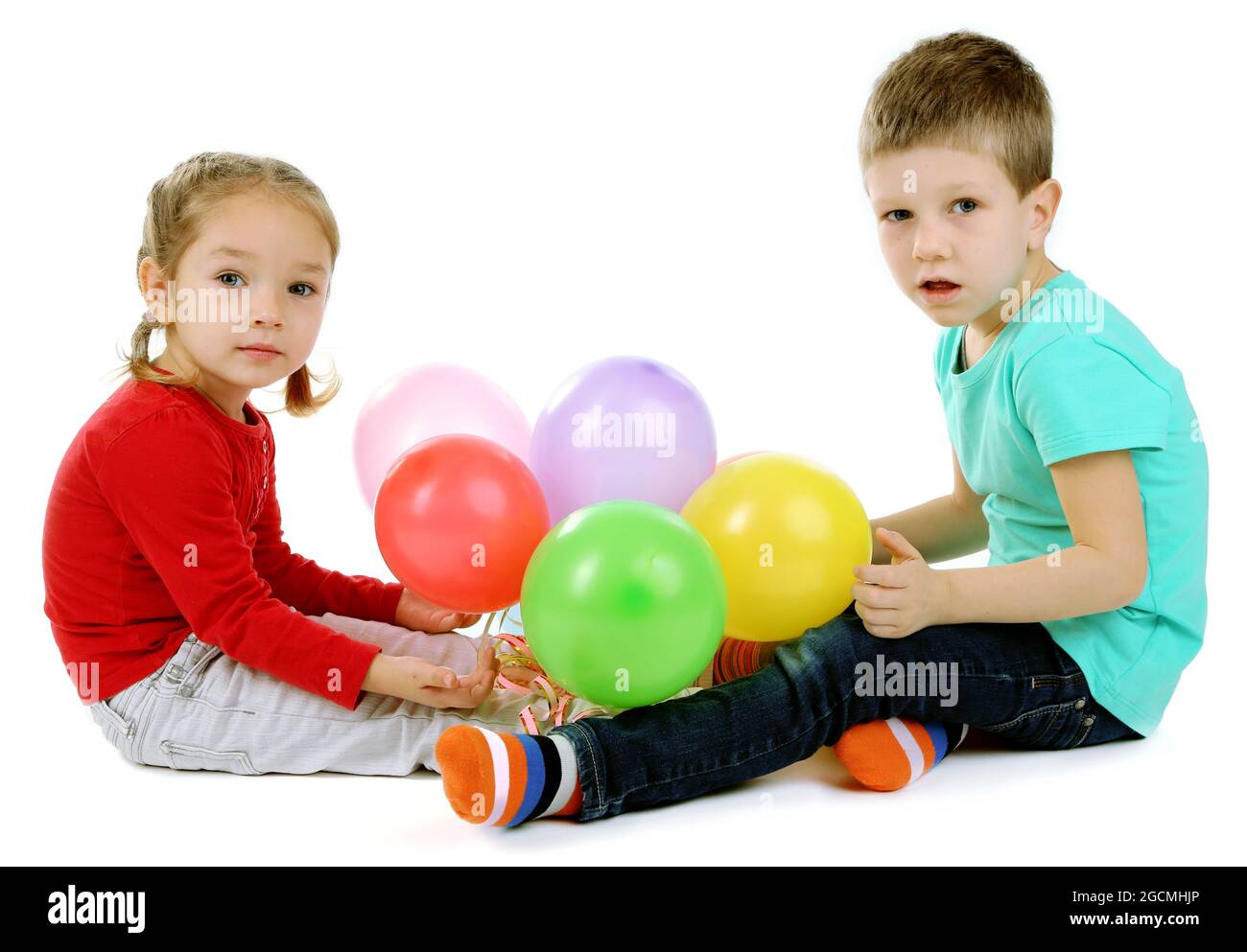 Little children with colorful balloons isolated on white Stock Photo ...