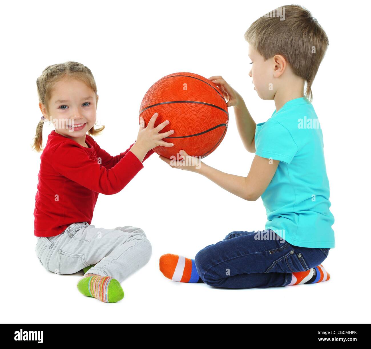Little children playing with ball isolated on white Stock Photo - Alamy
