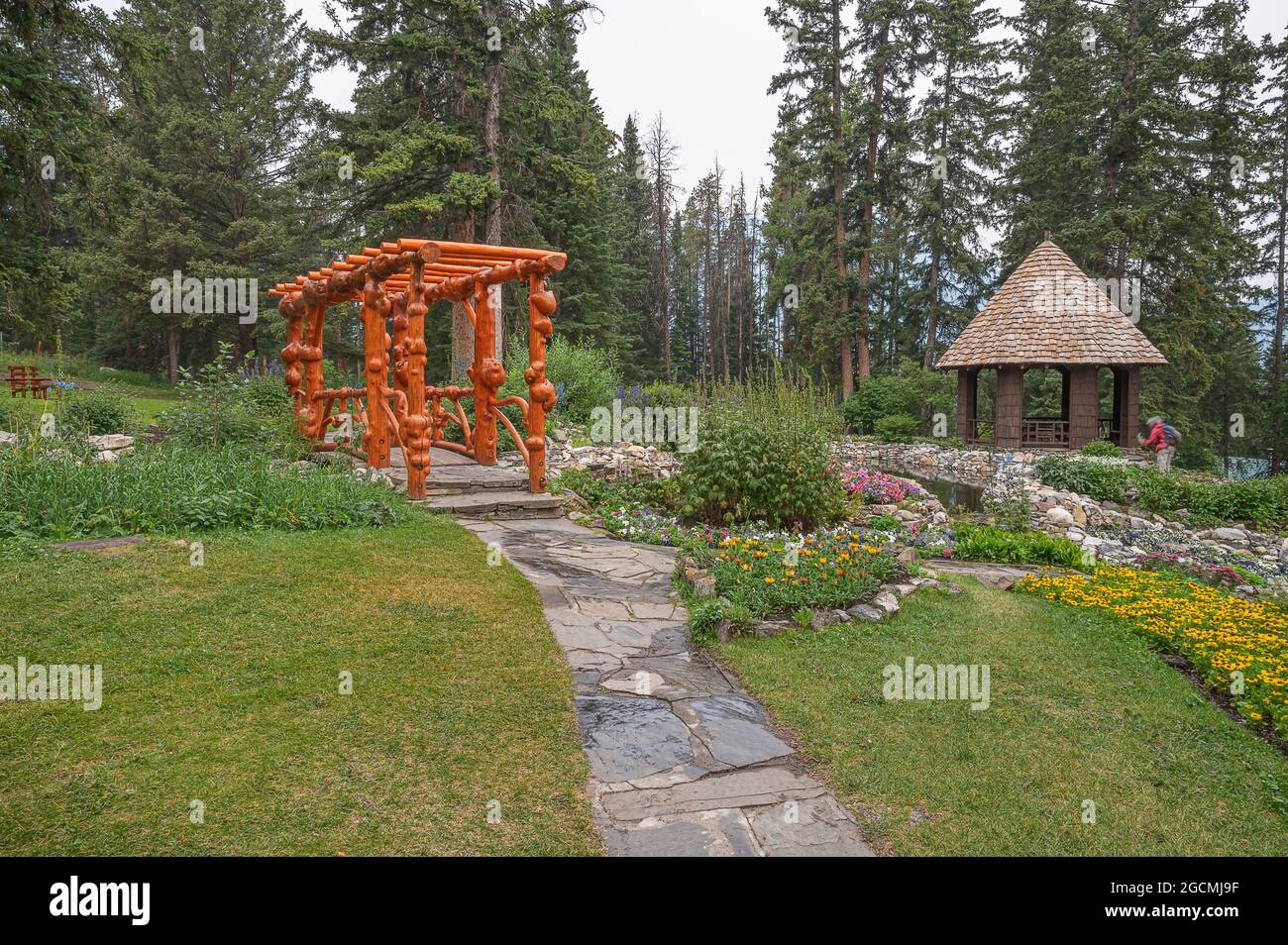 View of a gazebo and bridge in the Cascade public gardens in Banff ...