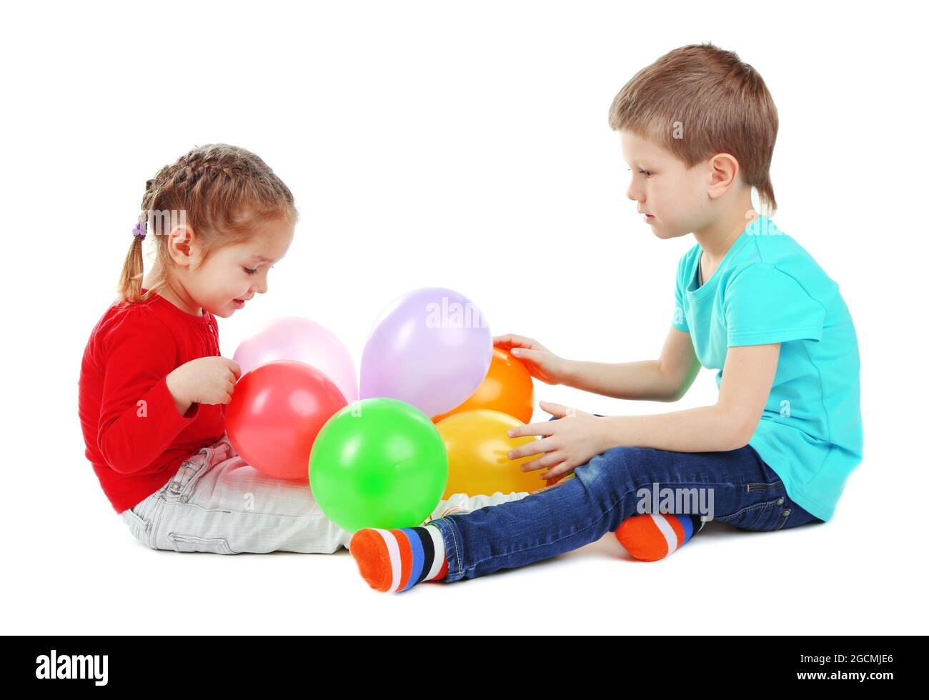 Little children with colorful balloons isolated on white Stock Photo ...