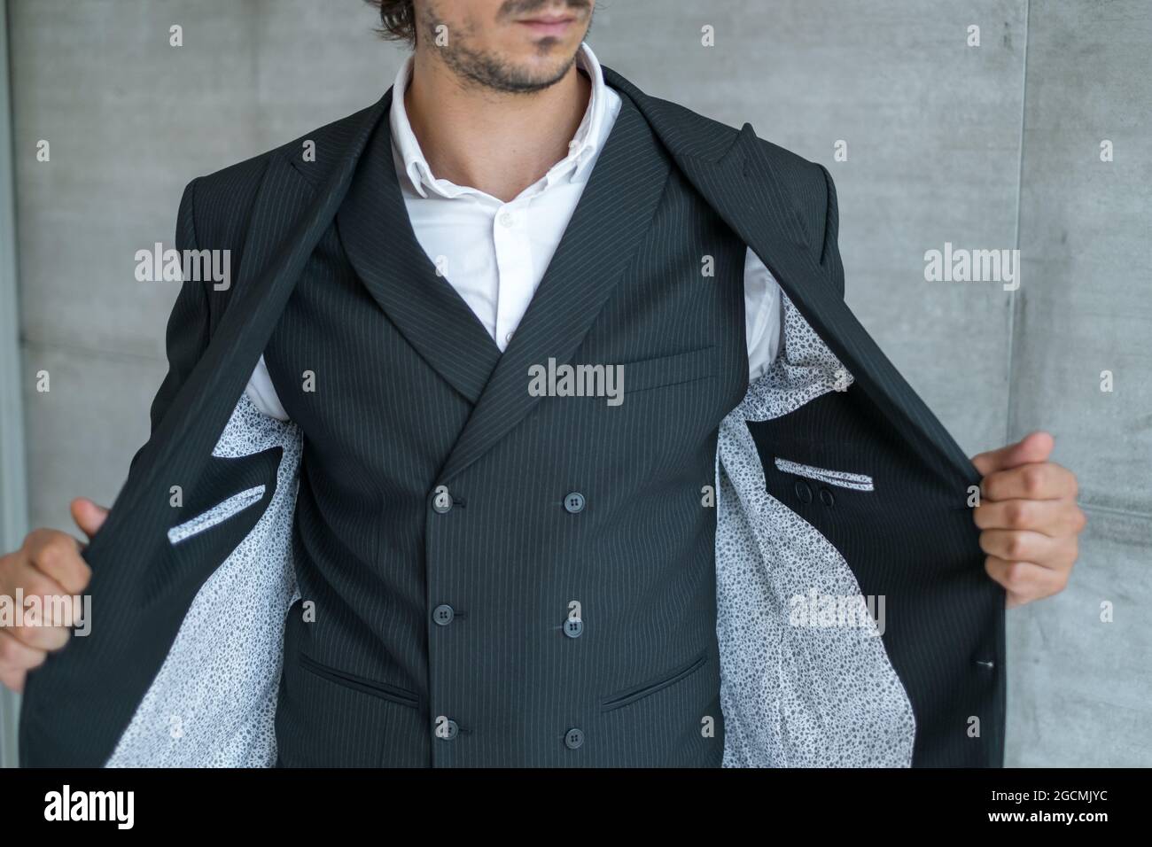 Black suit hi-res stock photography and images - Alamy