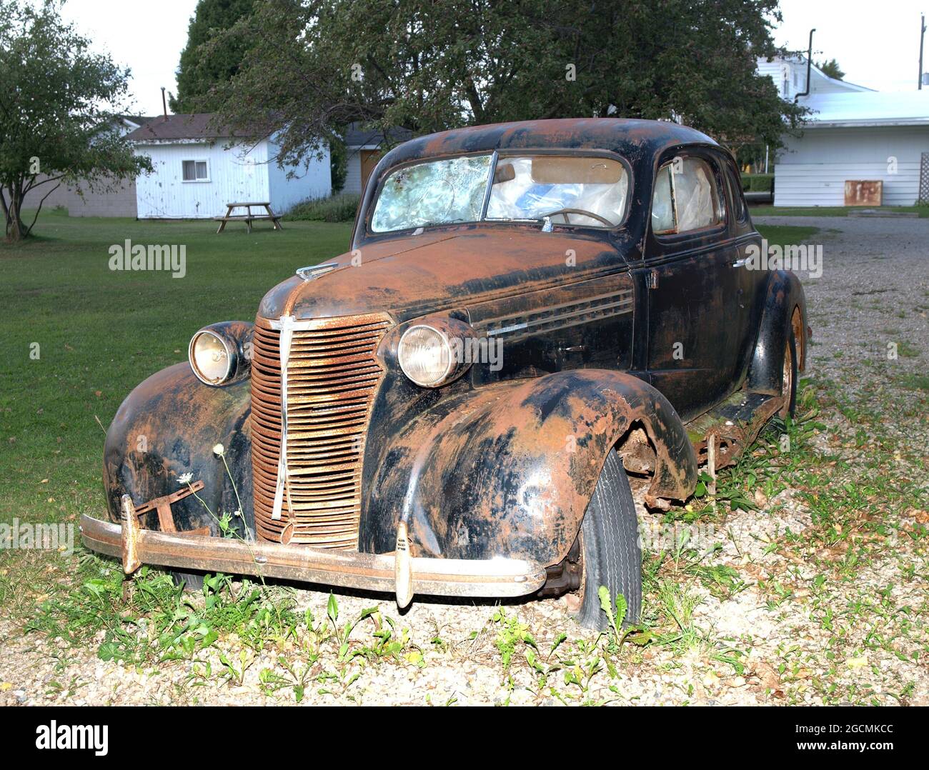 Abandoned wreck of old car Stock Photo - Alamy