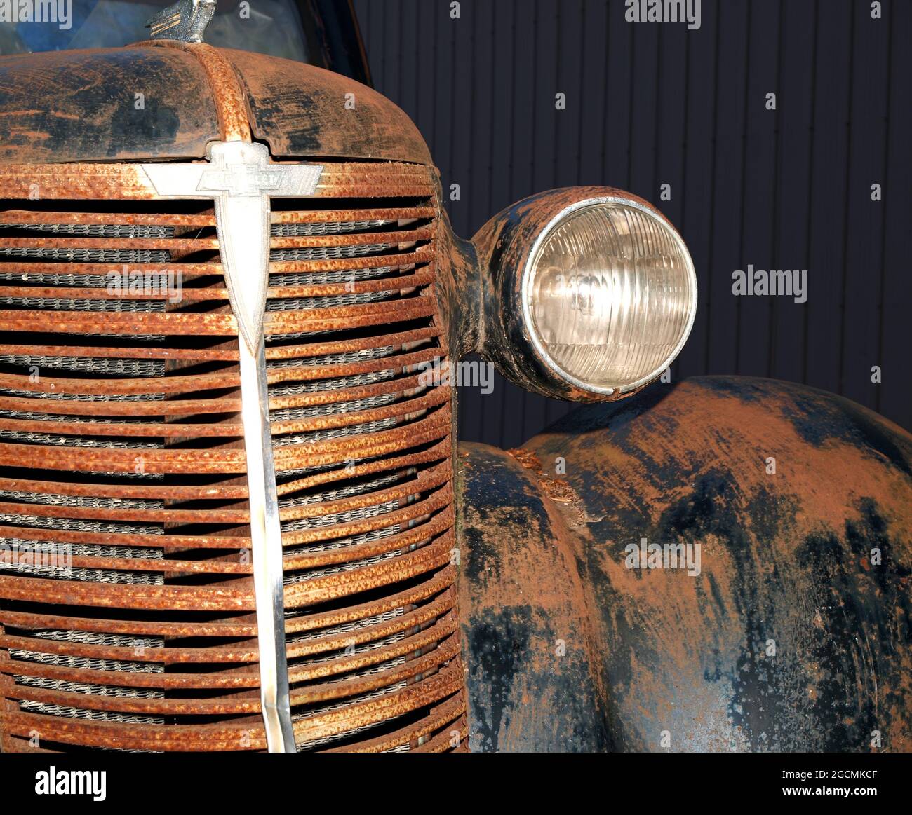 Radiator grille and headlight of old car Stock Photo - Alamy