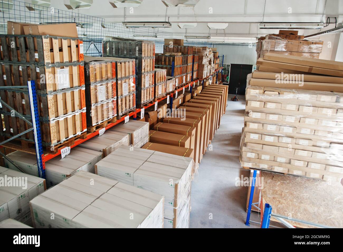 Interior of a modern warehouse storage of retail shop near shelves ...