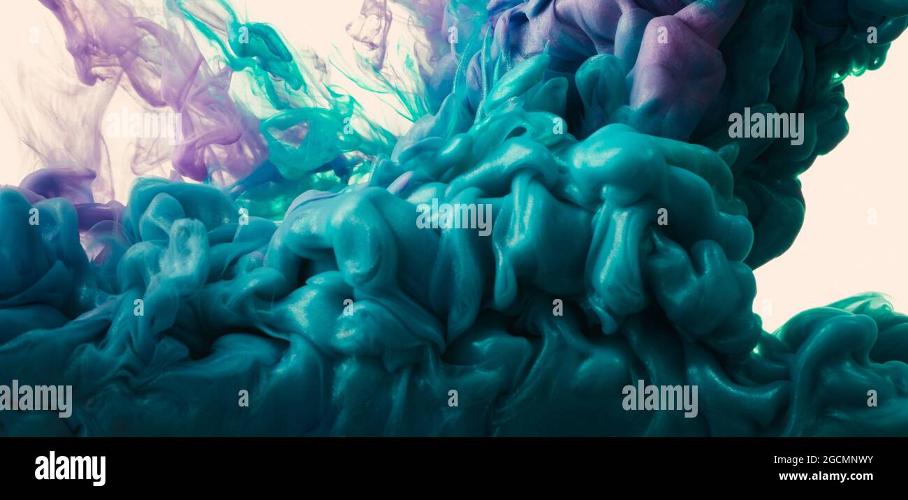 Ink drop in water background Stock Photo - Alamy