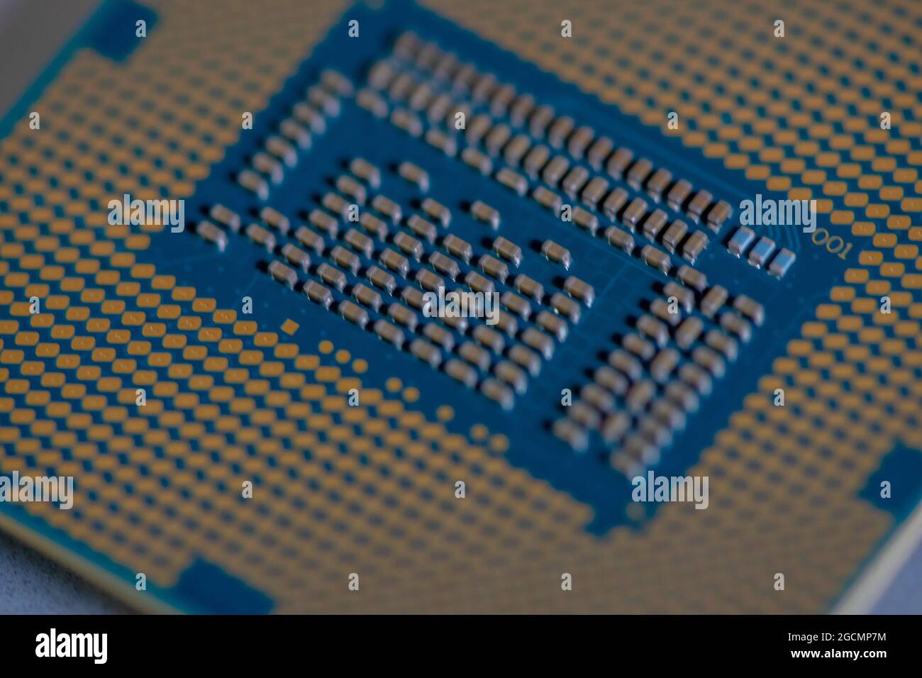Close-up of a CPU golden pads. Shallow depth of field Stock Photo - Alamy