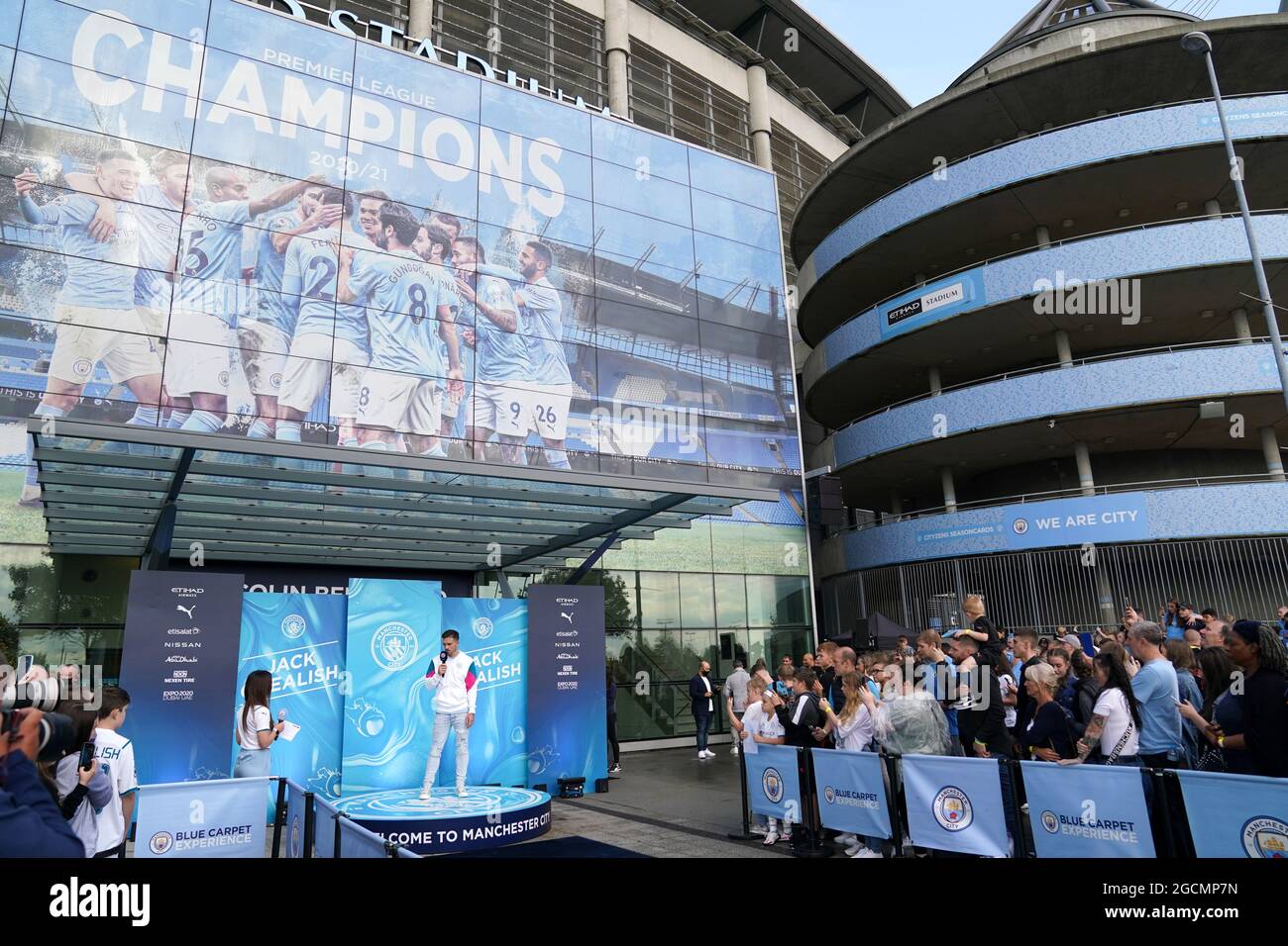 Manchester City's new singing Jack Grealish speaks to fans outside ...