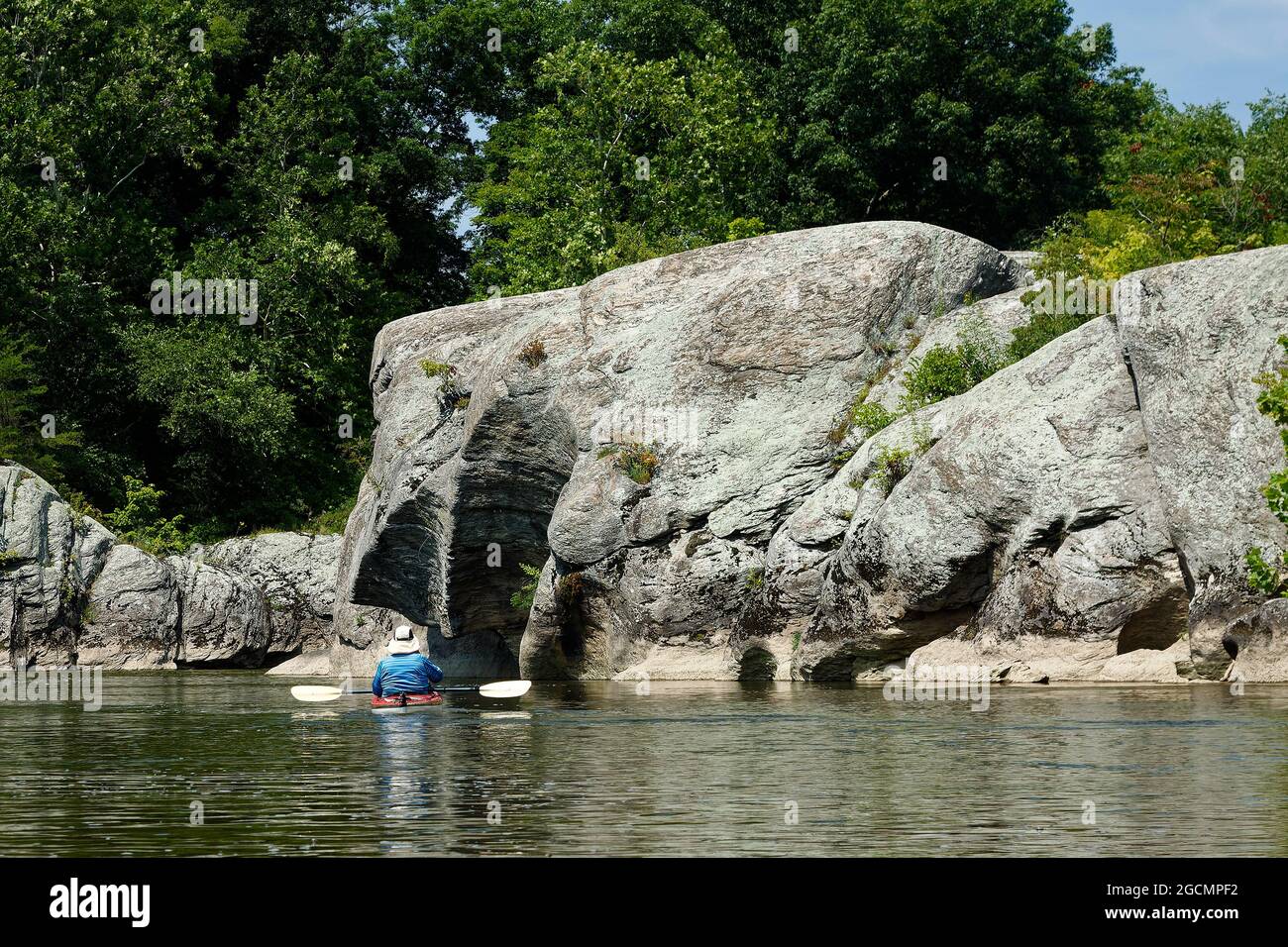 rock formations, sculpted by water, man in kayak, recreation, sport ...