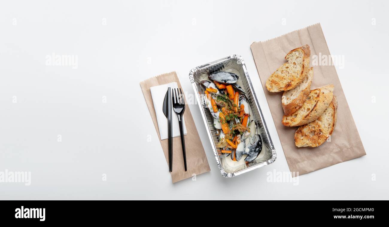 Delicious dish with seafood, ad of delivery service and restaurant, new ...