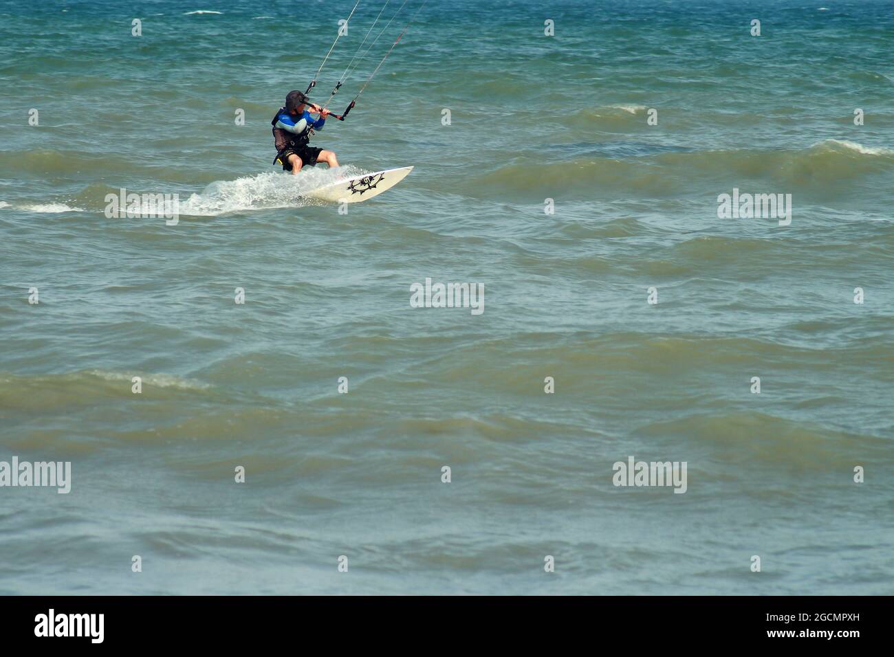 Kite surfer gliding the stormy sea of Azov in Ukraine Stock Photo - Alamy