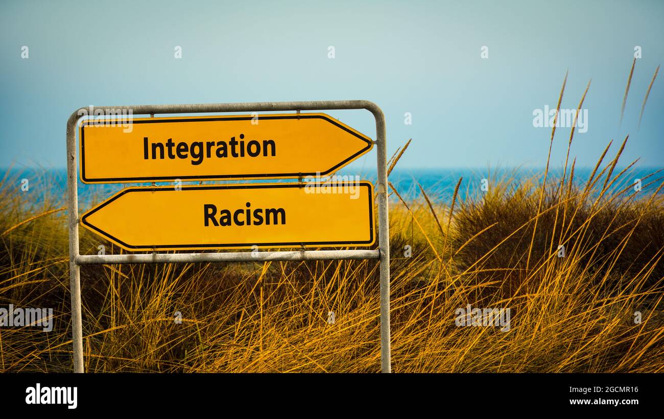 Street Sign the Direction Way to Integration versus Racism Stock Photo ...