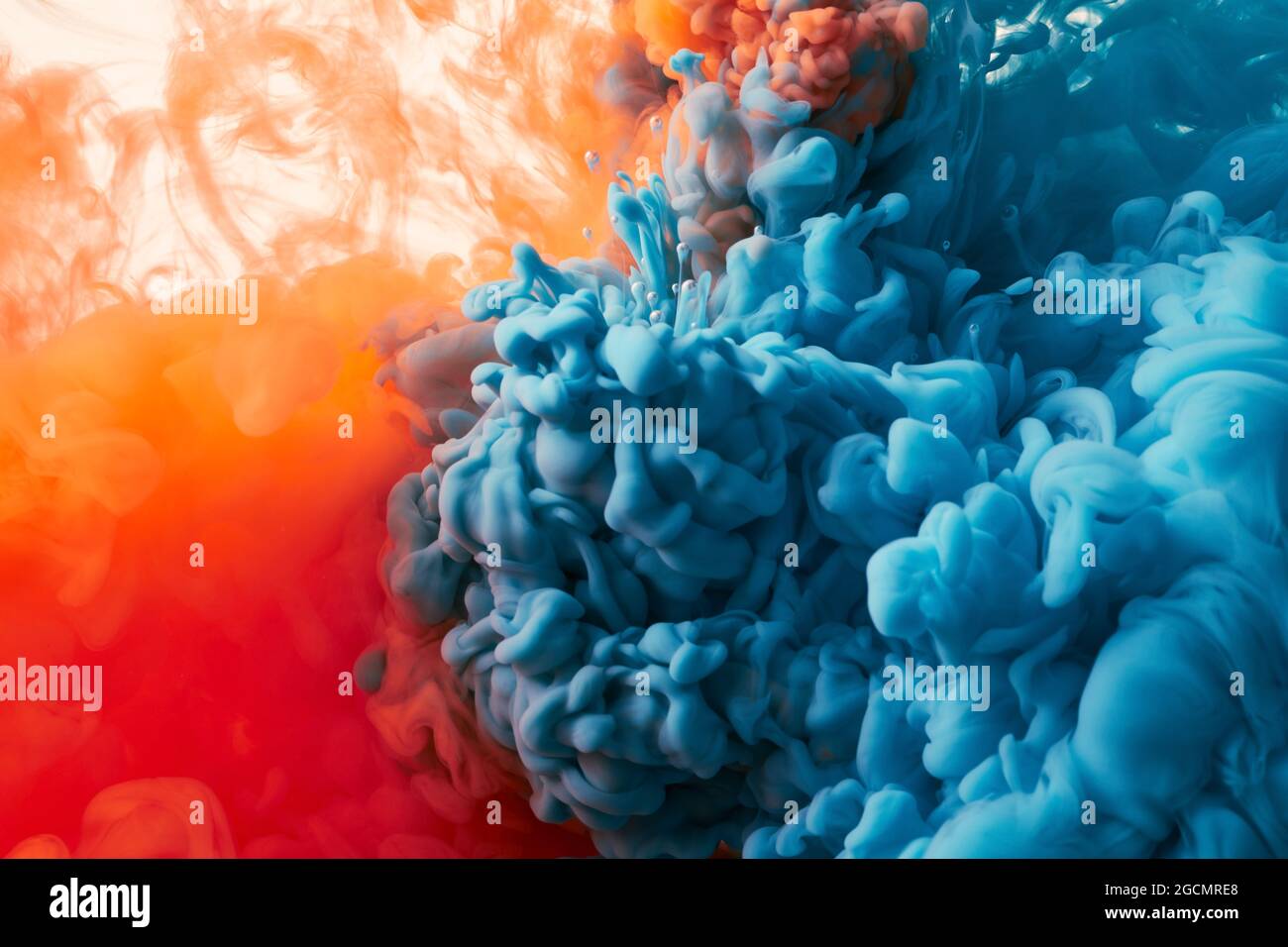 Ink drop in water background Stock Photo - Alamy