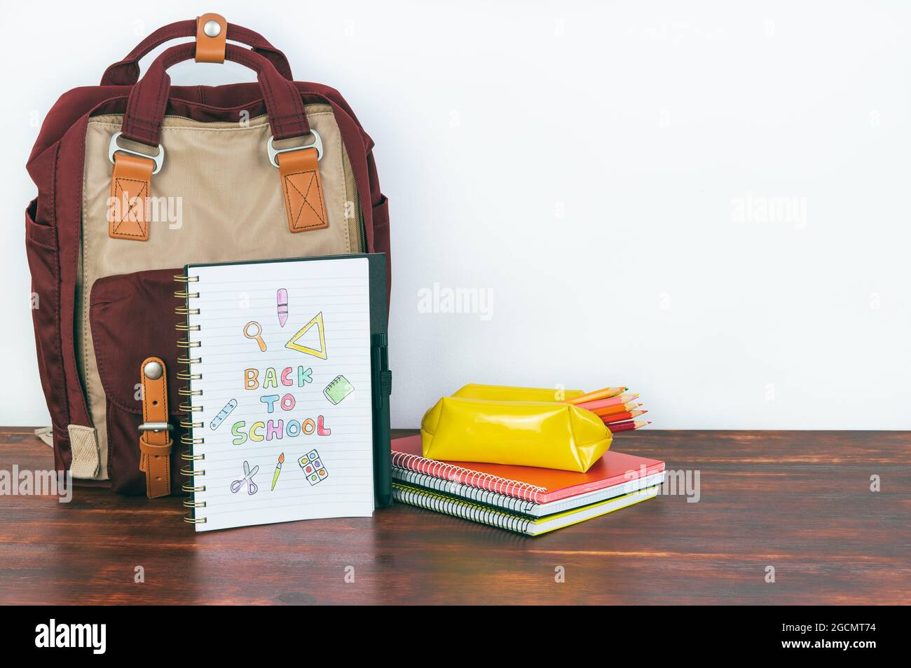 Notebook with back to school drawing. Backpack and school supplies with ...