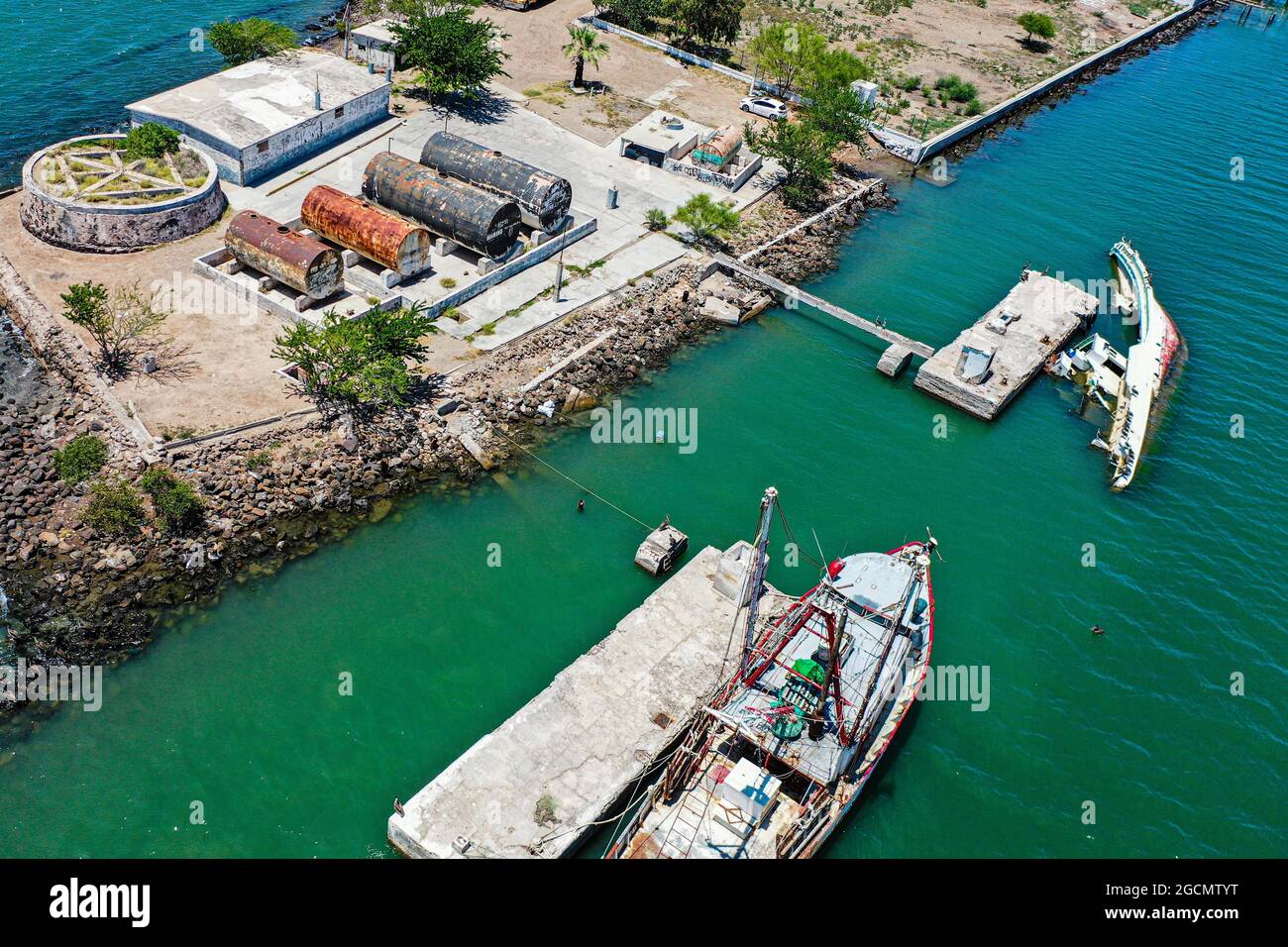 Fishing boat sails out to sea, departing from Yavaros port. sardine ...
