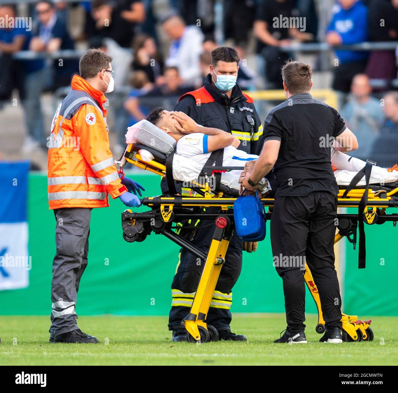 Stretcher on football pitch hi-res stock photography and images - Alamy