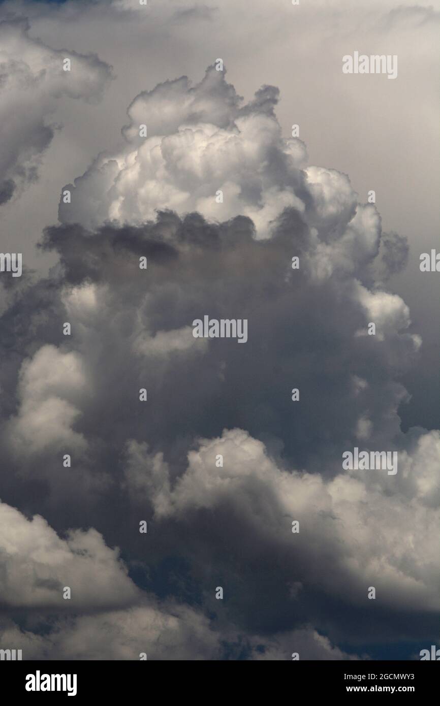 Cumulus clouds float high in the sky over New Mexico in the American ...