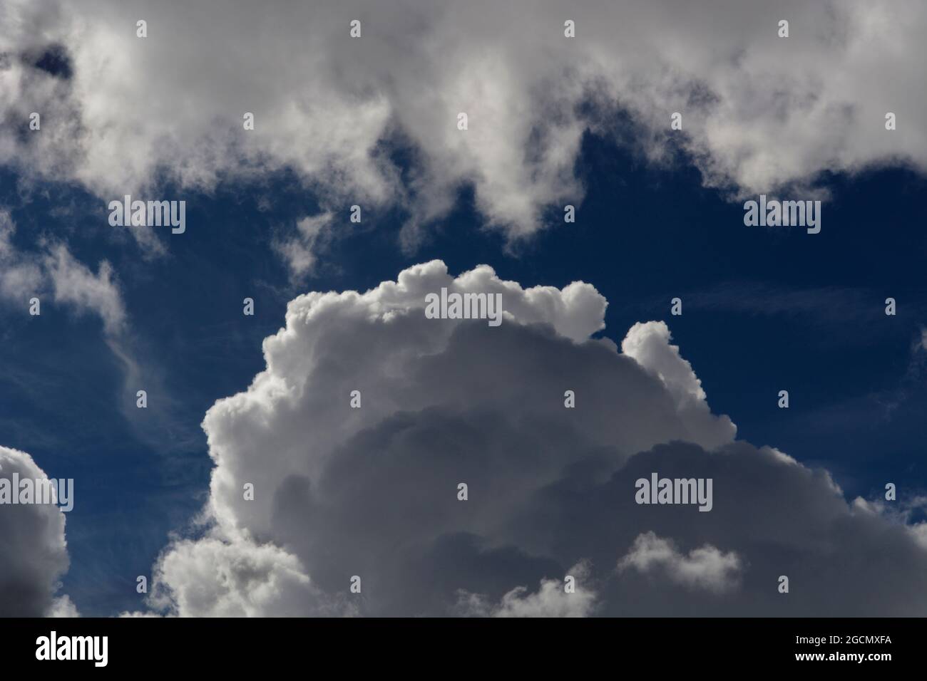 Cumulus clouds float high in the sky over New Mexico in the American ...
