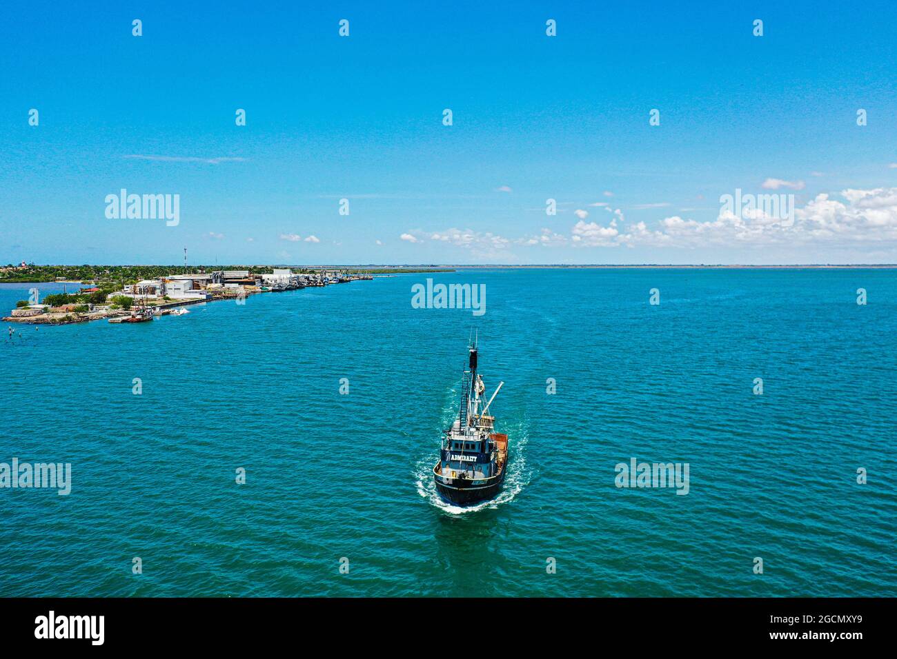 Fishing boat sails out to sea, departing from Yavaros port. sardine ...
