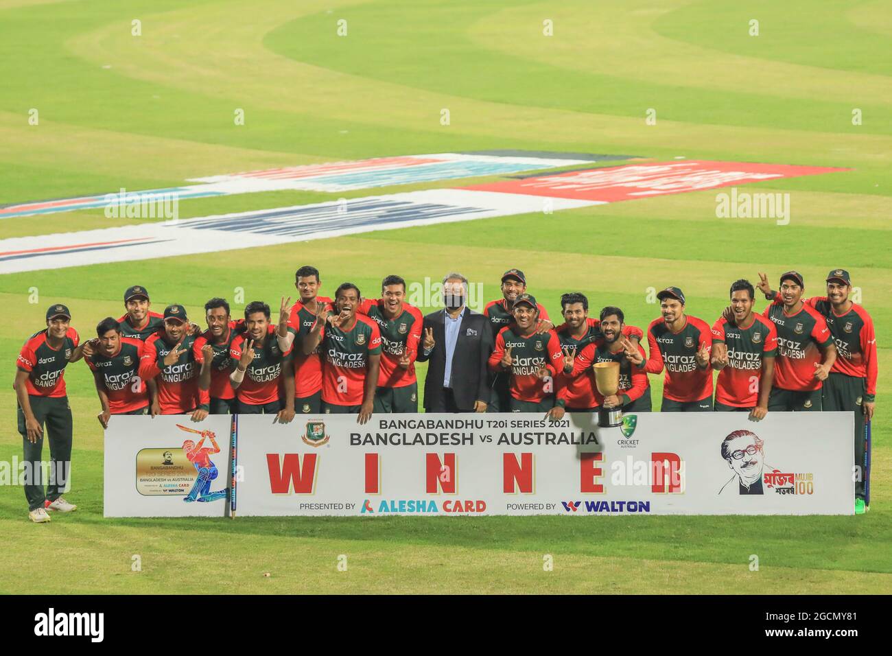 Team Bangladesh pose for photographs with the T20 Trophy during the T20 ...